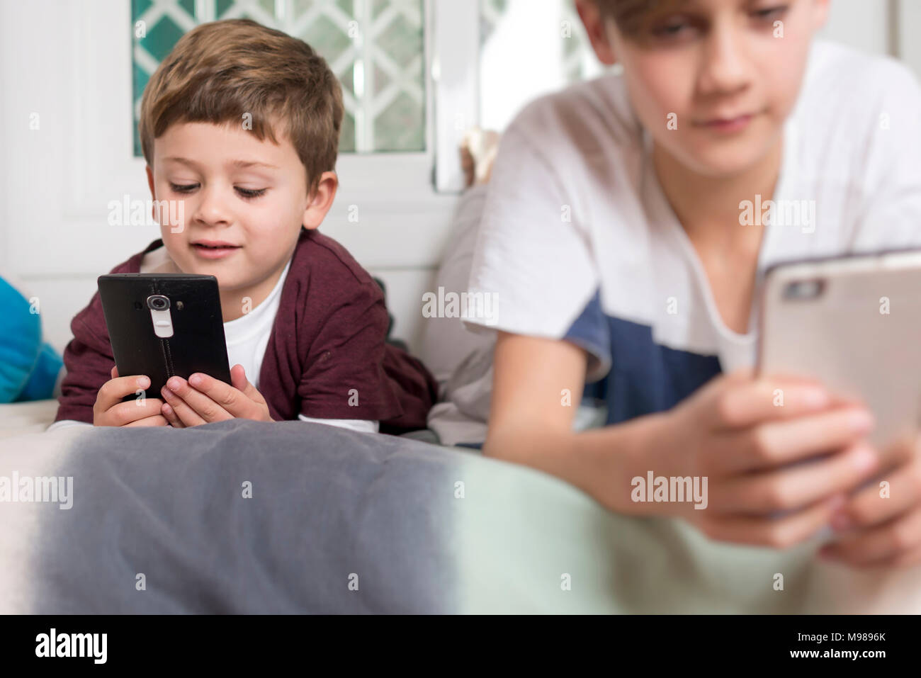 Two boys hi-res stock photography and images - Alamy