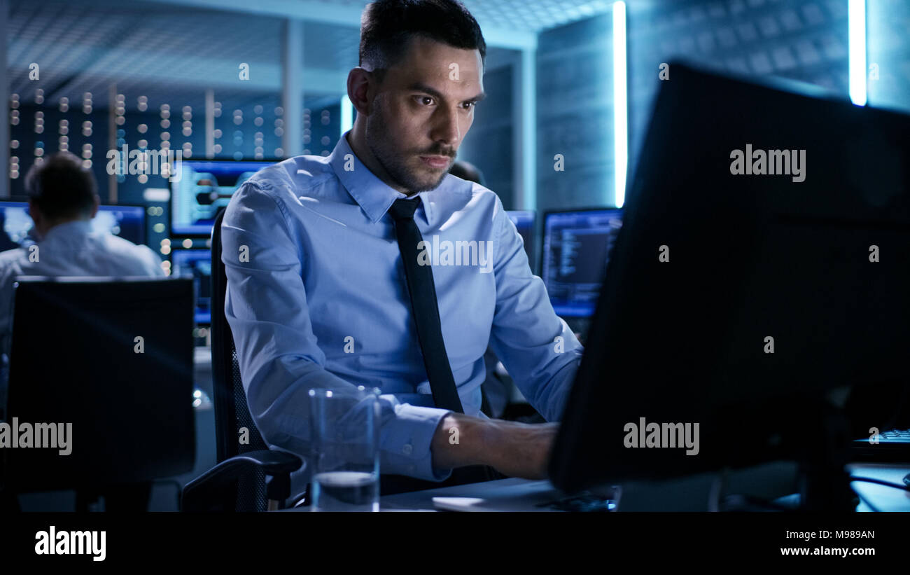 Close-up of Technical Engineer Working on His Computer With Multiple ...