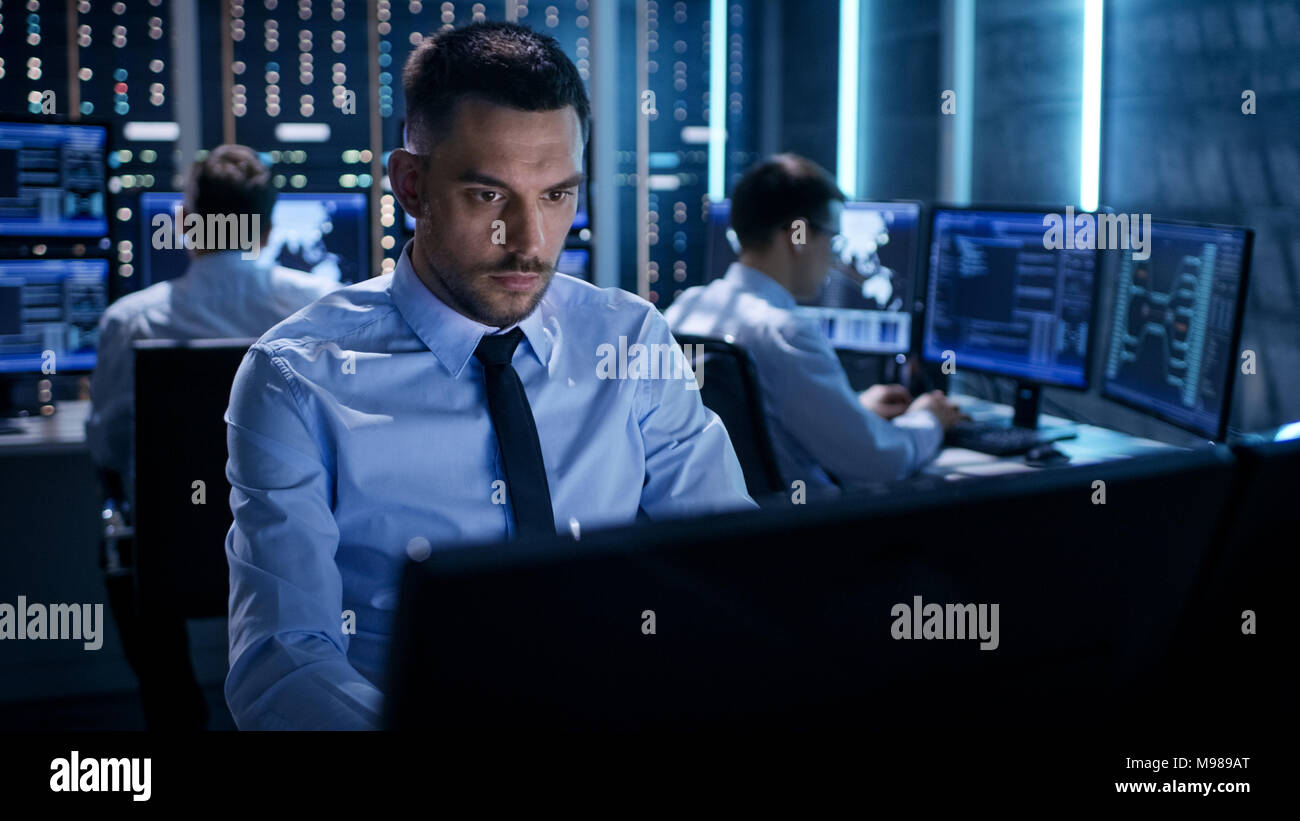 Close-up of Technical Engineer Working on His Computer With Multiple ...