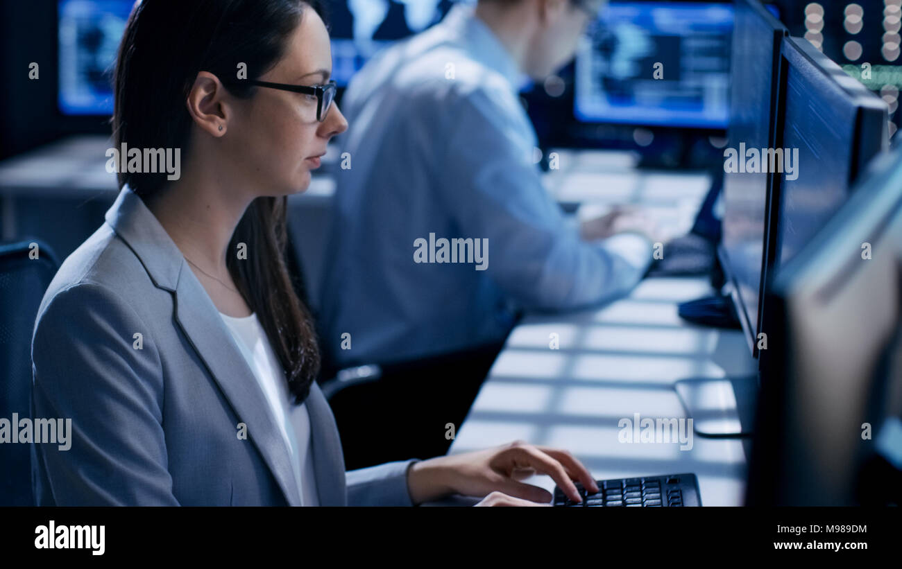 Female Engineer Controller Observes Working of the System. In the ...