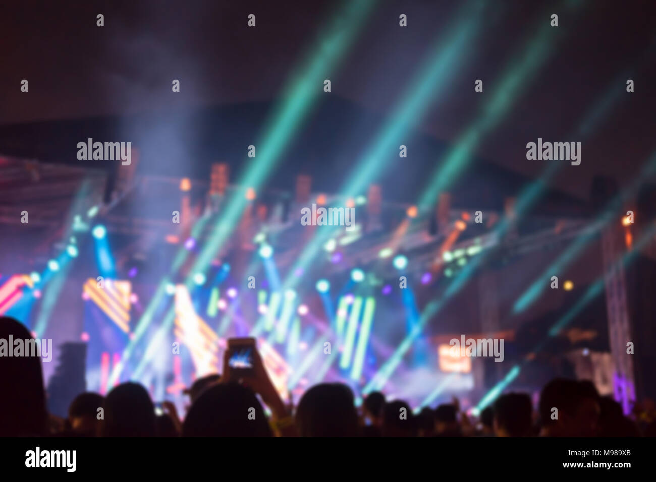 Blurred background : Bokeh lighting in outdoor concert with cheering ...