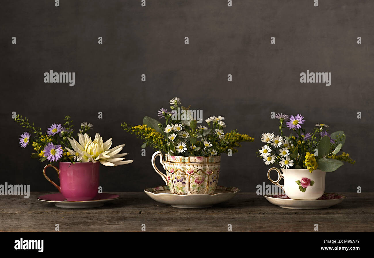 Summer flowers in tea cups Stock Photo - Alamy
