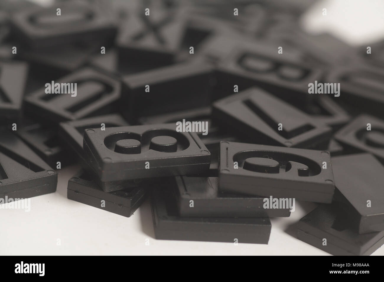 letterpress alphabet and number on a white background Stock Photo - Alamy
