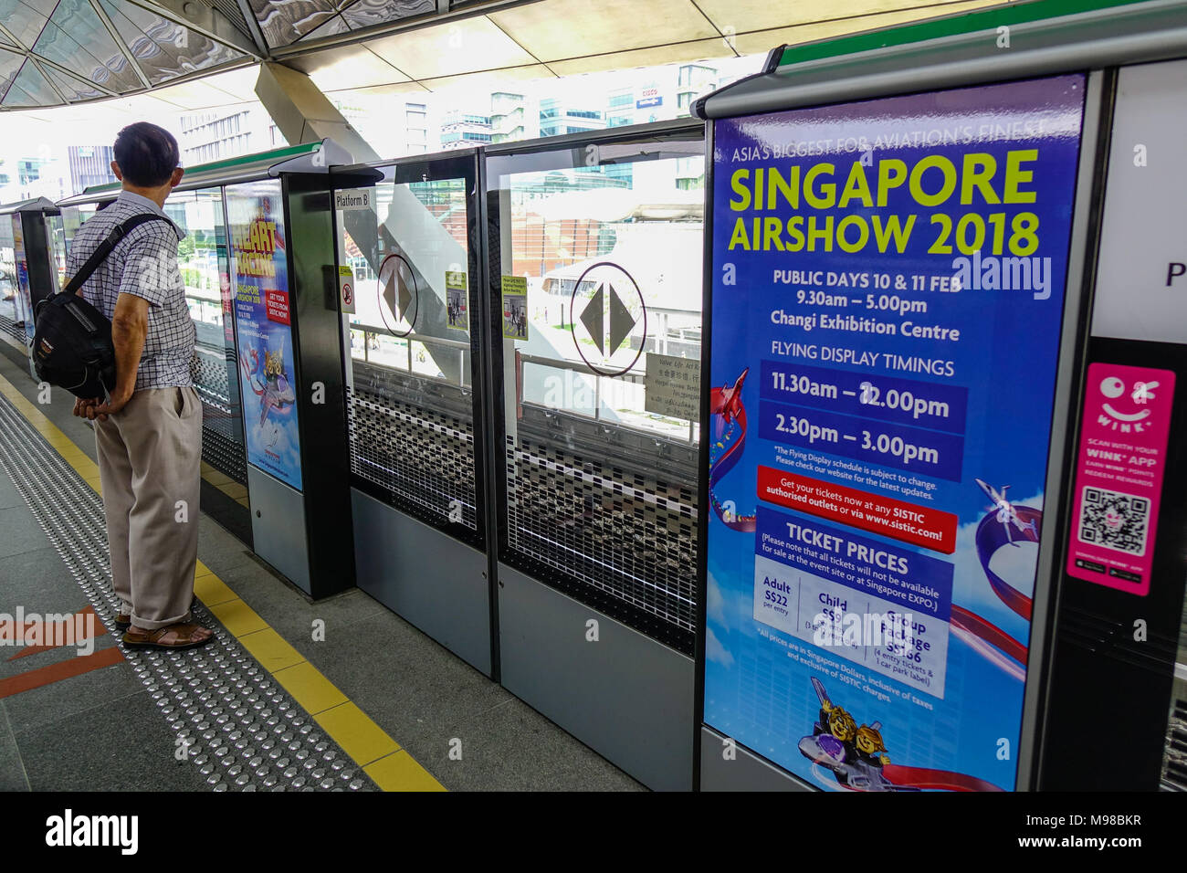 Singapore - Feb 11, 2018. People waiting at MRT station in Singapore ...