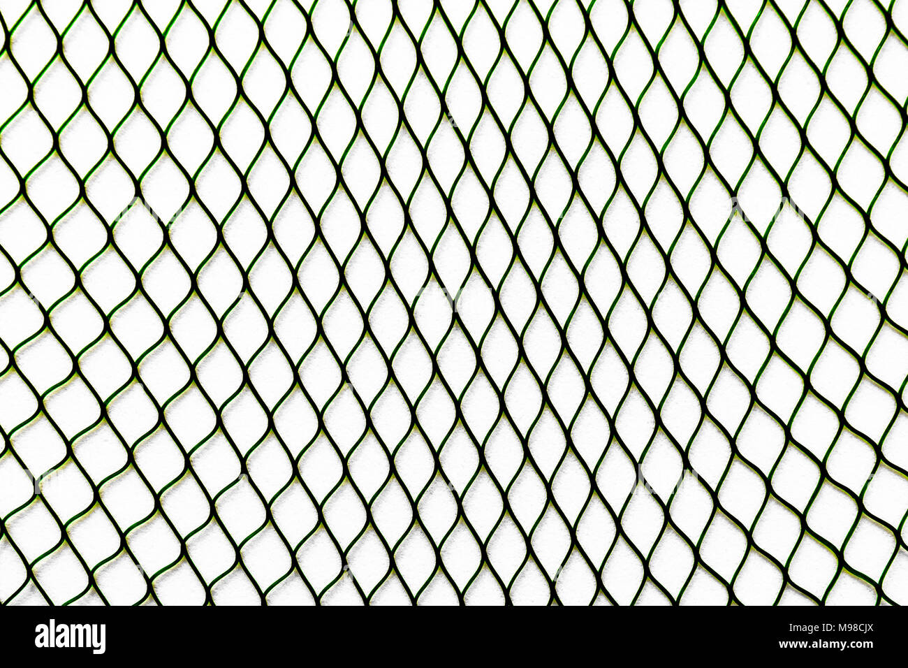 Black net placed vertically on the white soft background surface Stock ...