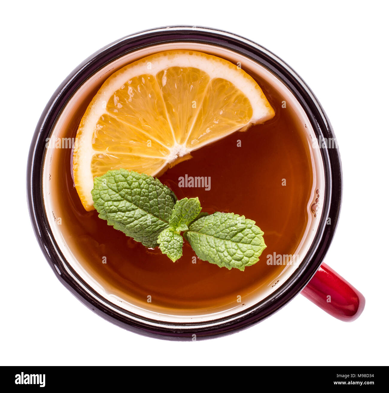 Mug of black tea with lemon and mint top view isolated Stock Photo - Alamy