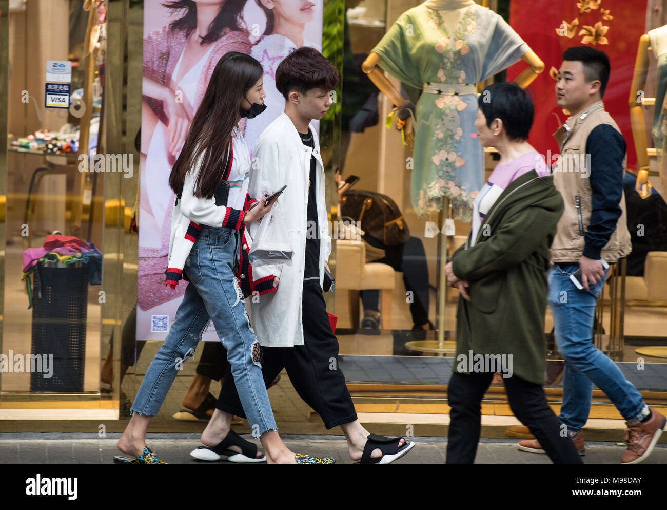People walking along a main shopping street in Shanghai, China Stock ...