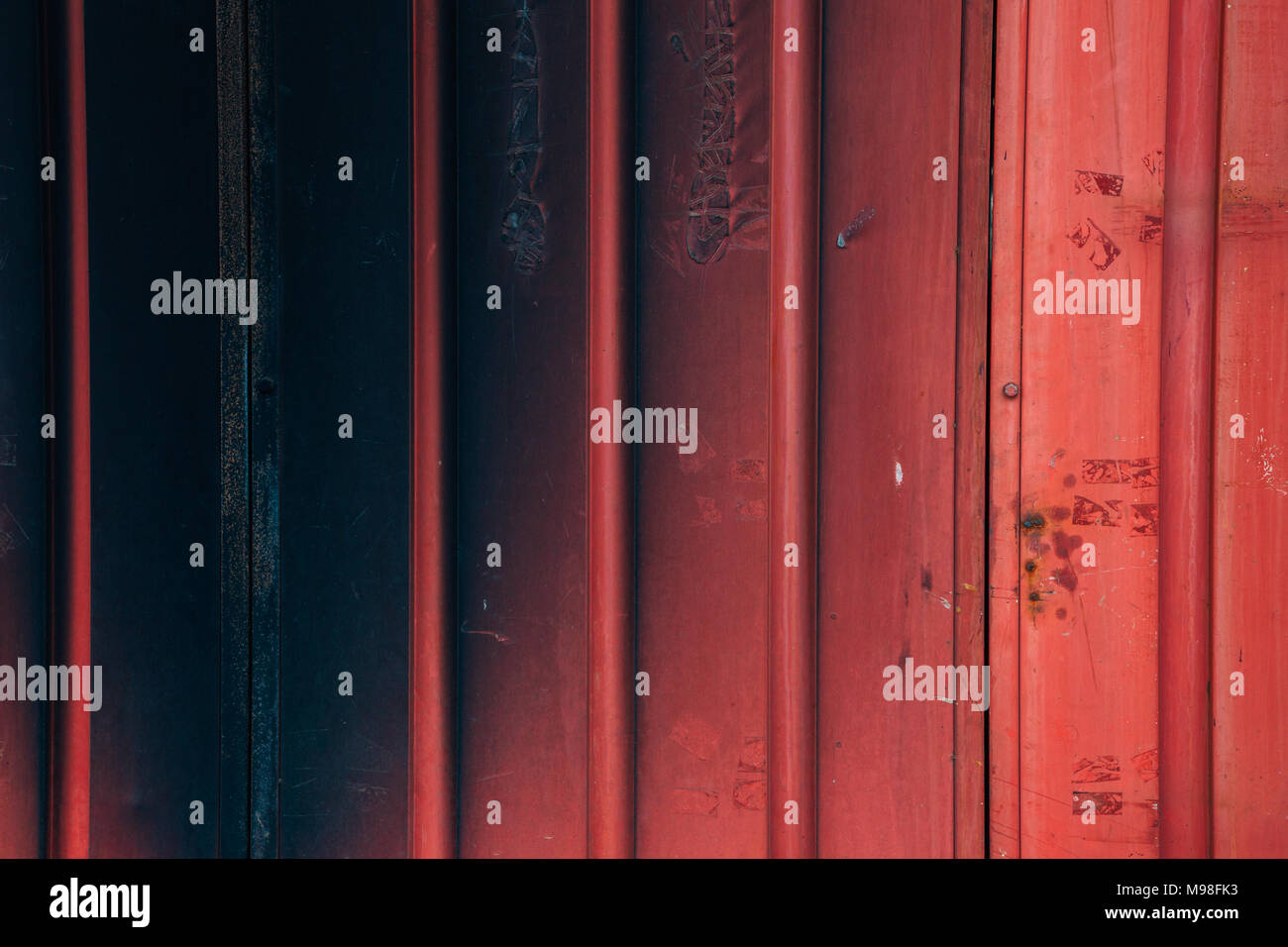 Vintage red shutter door background Stock Photo - Alamy