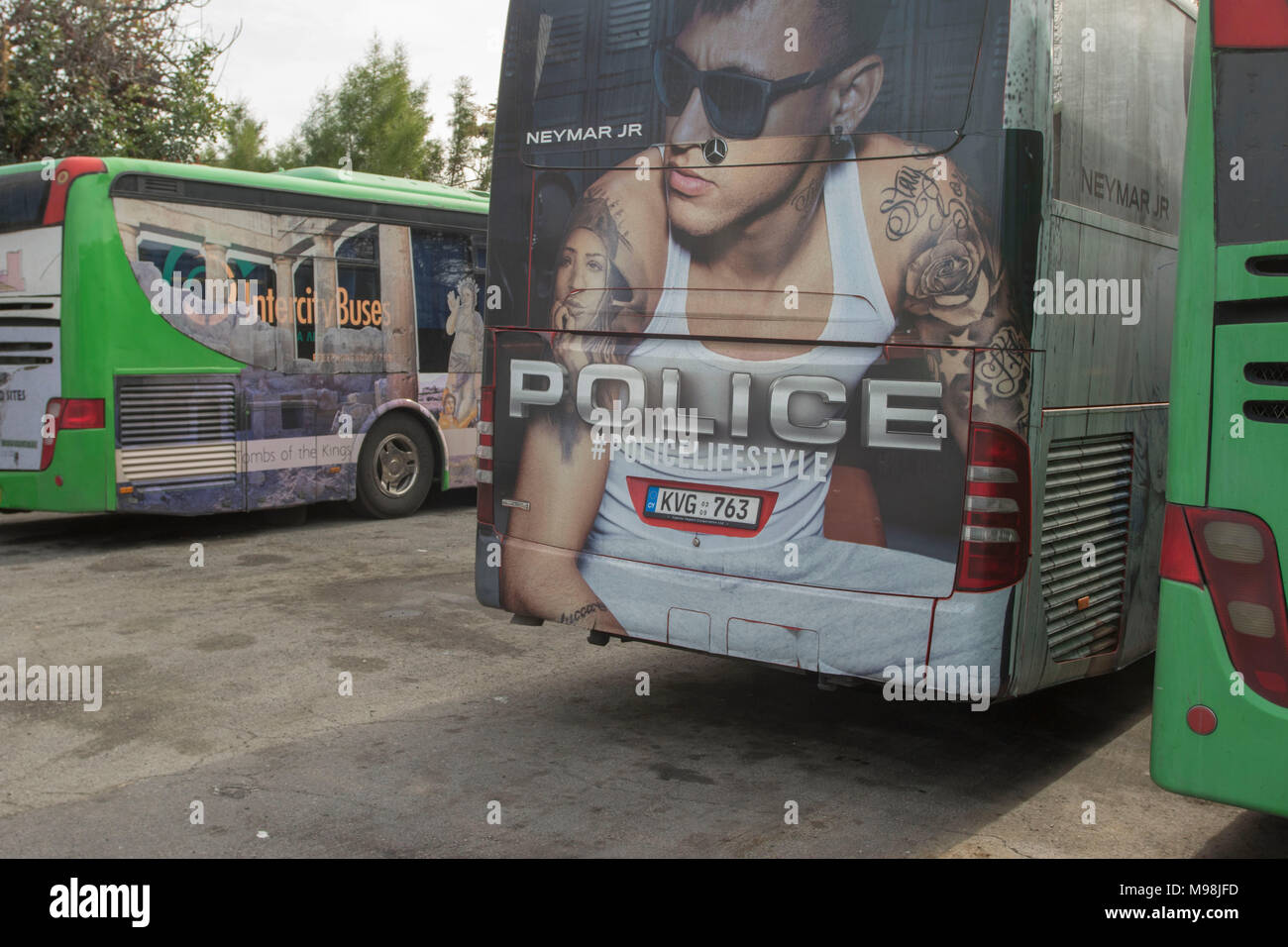 Colourful public transport at the Karavella bus station in spring ...