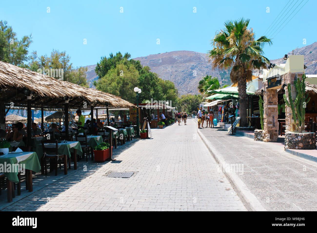 Santorini, Greece - July 20, 2013 : Restaurant terrace in Kamari beach ...
