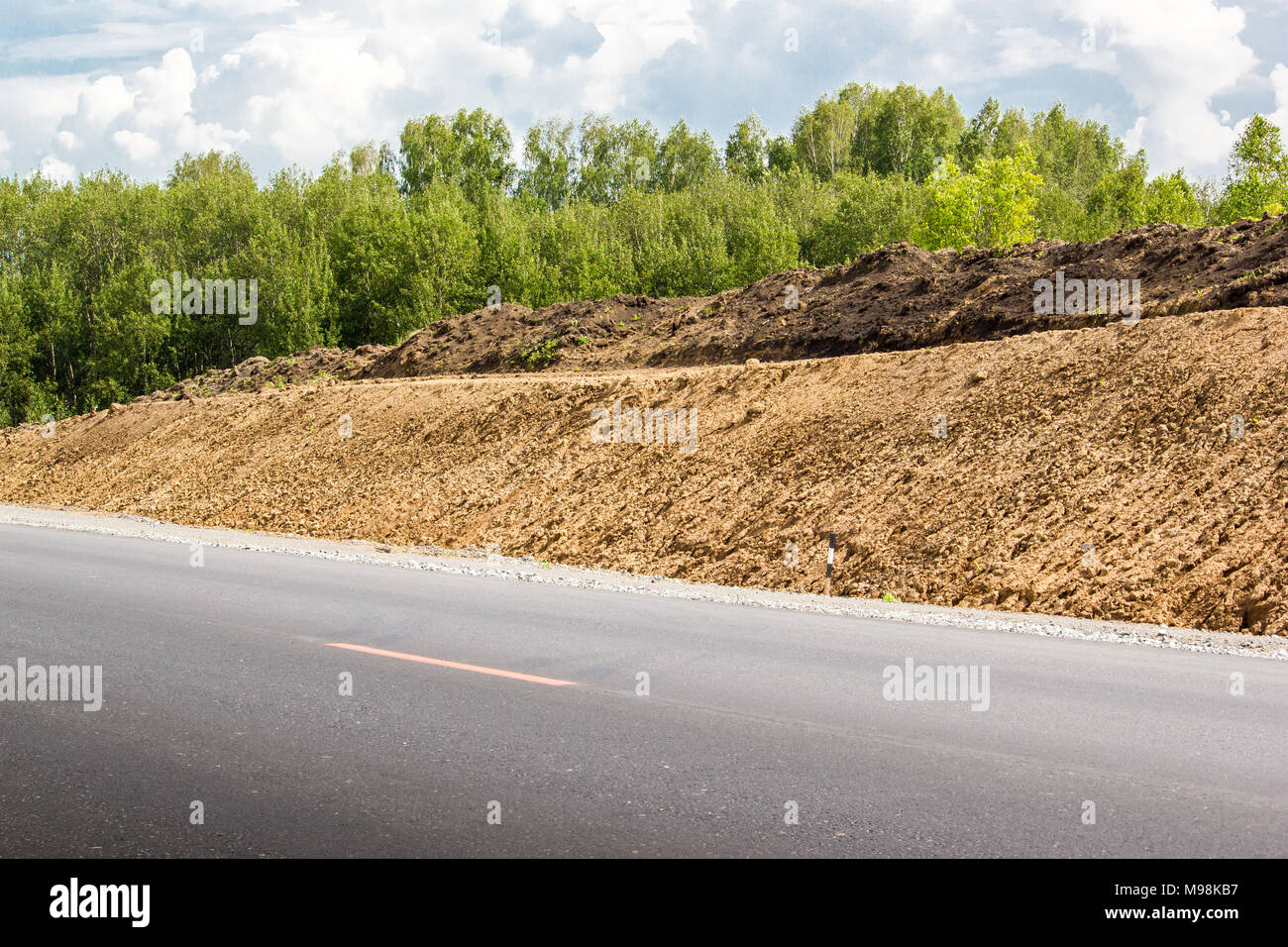 Old asphalt road with dividing line Stock Photo - Alamy