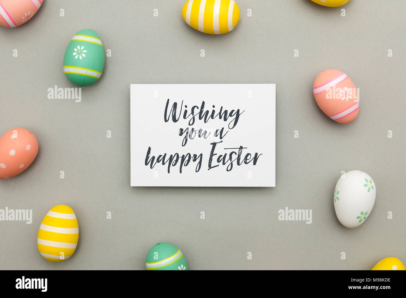 Colourful easter eggs with a handwritten easter message Stock Photo - Alamy