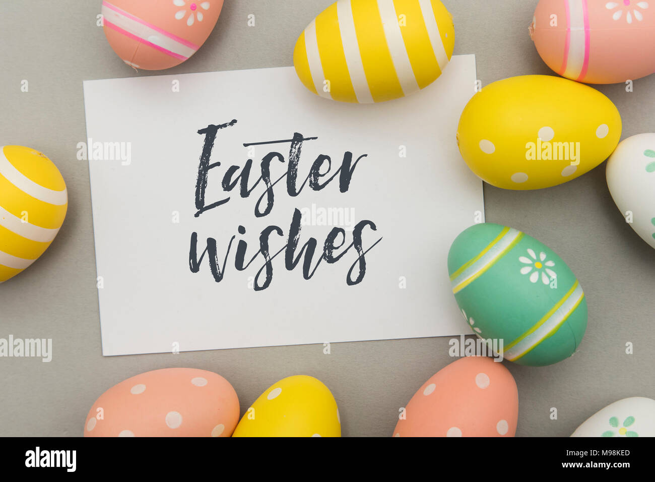 Colourful easter eggs with a handwritten easter message Stock Photo - Alamy