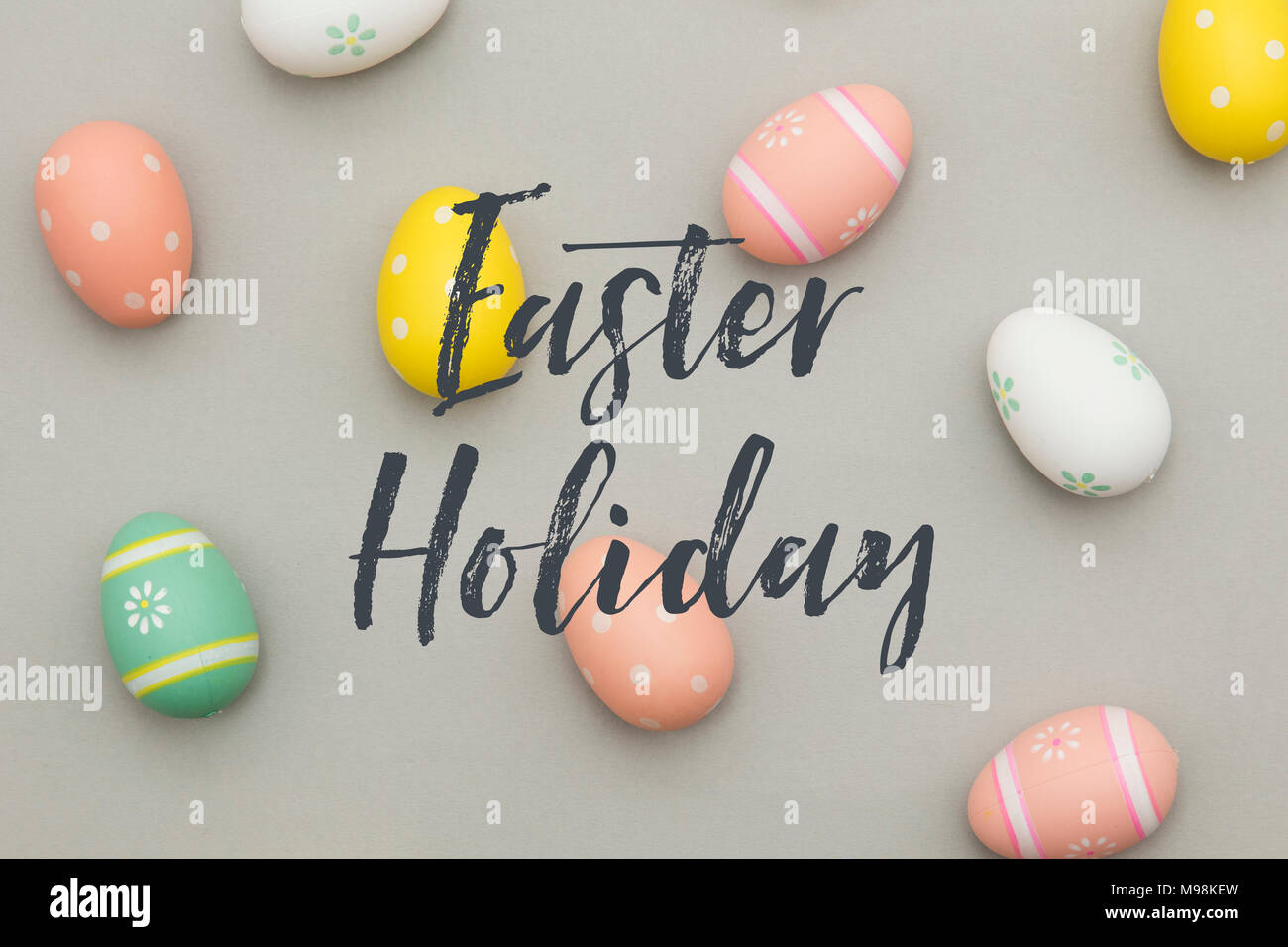 Colourful easter eggs with a handwritten easter message Stock Photo - Alamy