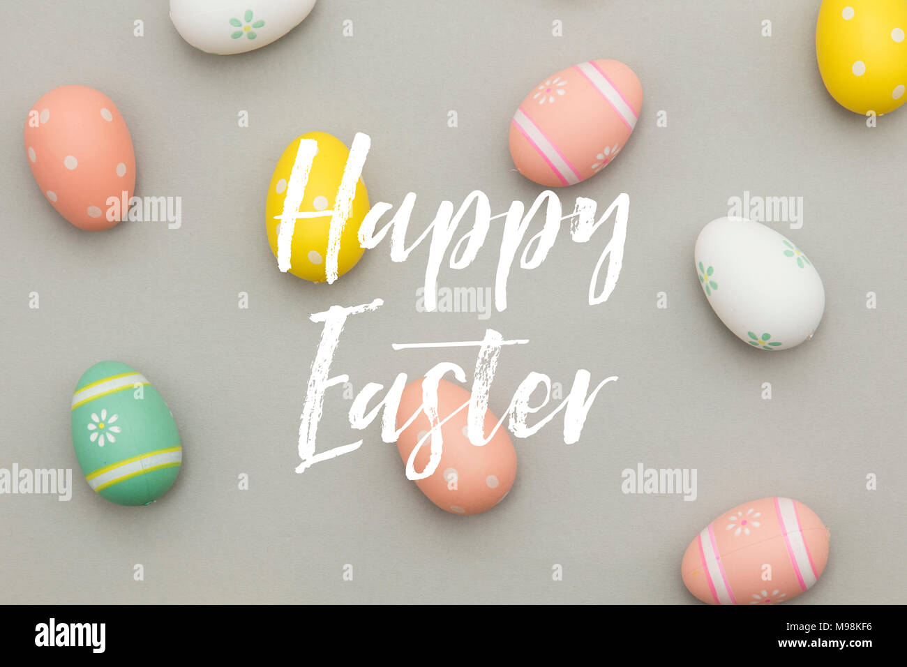 Colourful easter eggs with a handwritten easter message Stock Photo - Alamy