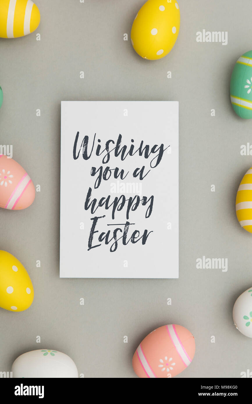 Colourful easter eggs with a handwritten easter message Stock Photo - Alamy