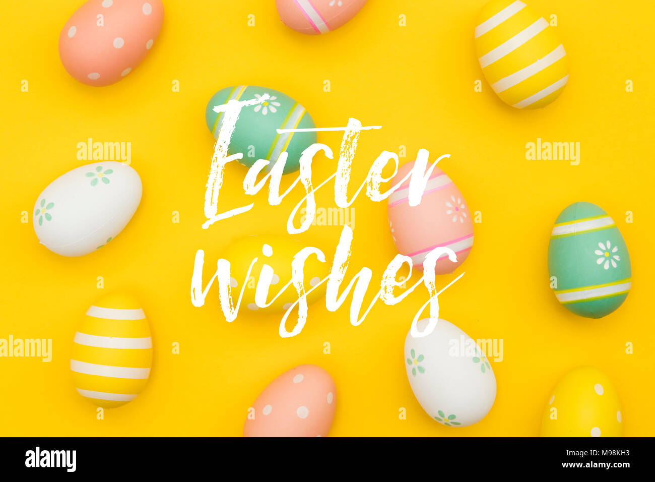 Colourful easter eggs with a handwritten easter message Stock Photo - Alamy