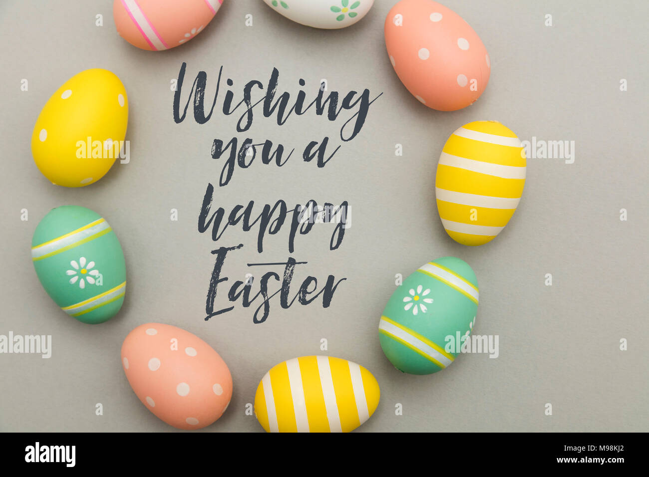 Colourful easter eggs with a handwritten easter message Stock Photo - Alamy