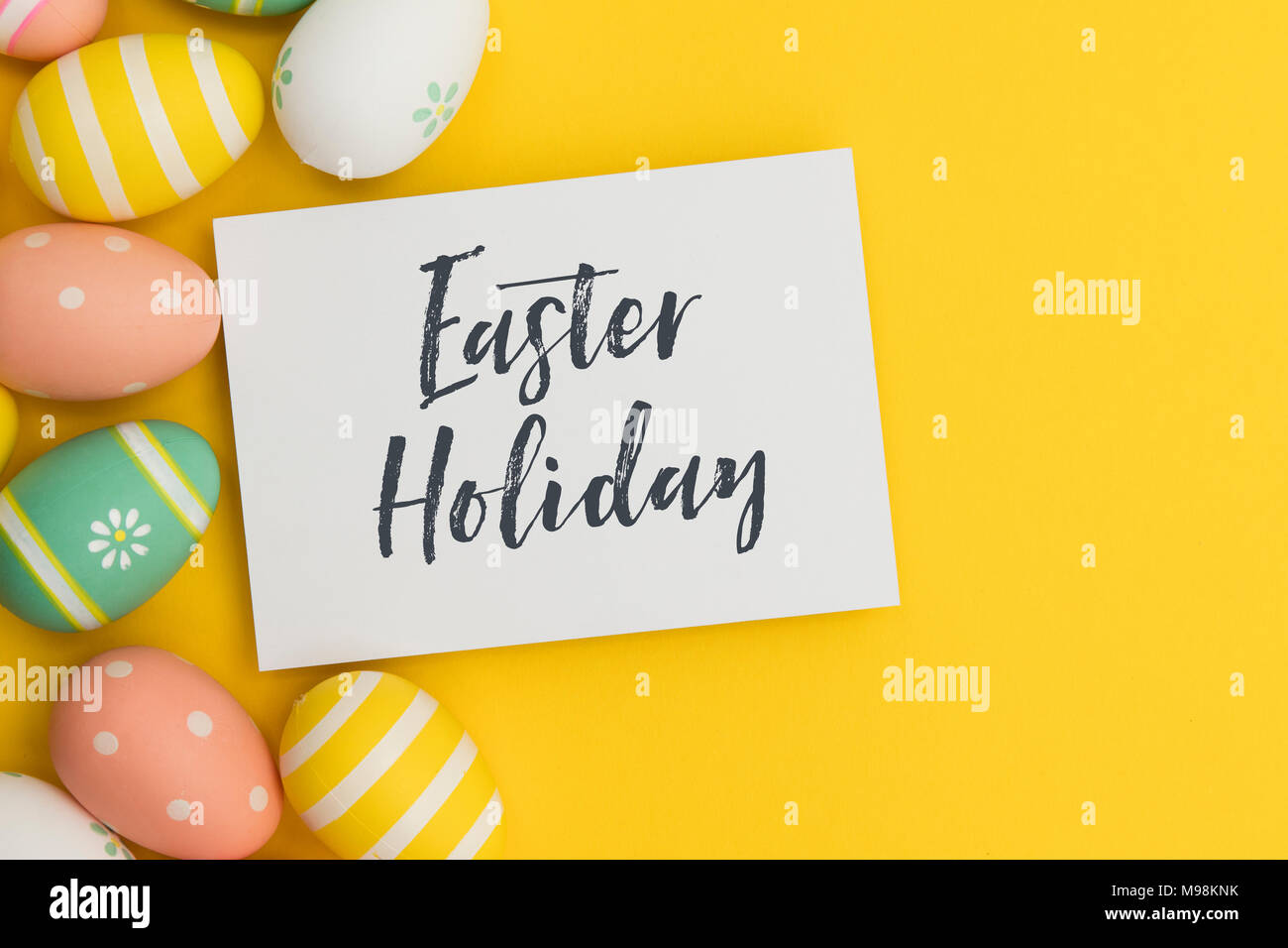 Colourful easter eggs with a handwritten easter message Stock Photo - Alamy