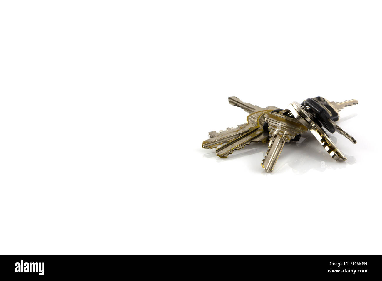 Large bunch of keys isolate on white background Stock Photo - Alamy