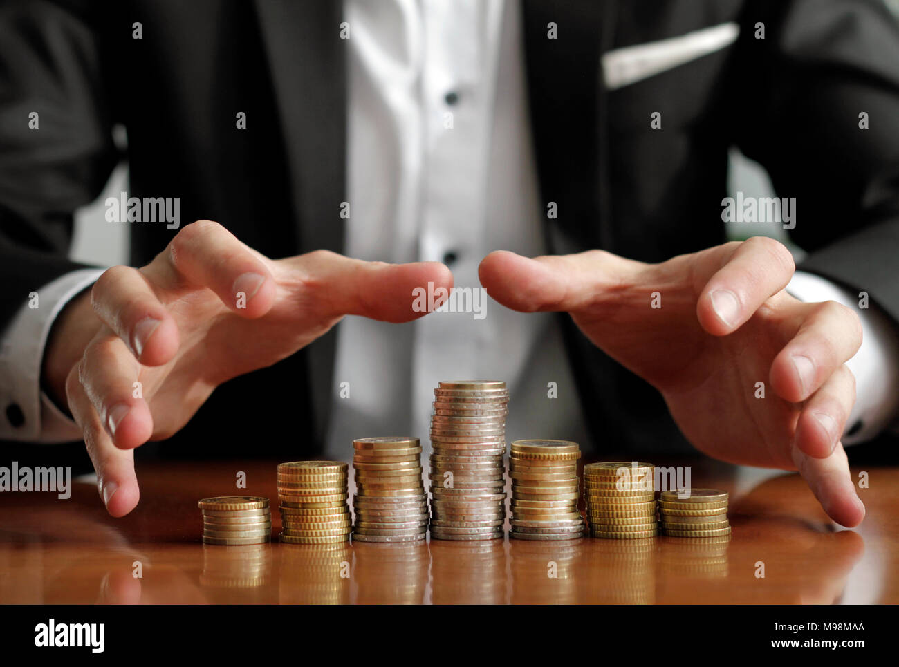 Hands grabbing cash hi-res stock photography and images - Alamy
