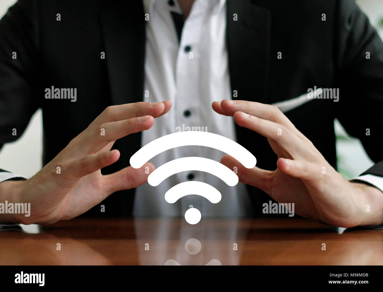 Man protecting WiFiwith hands Stock Photo - Alamy