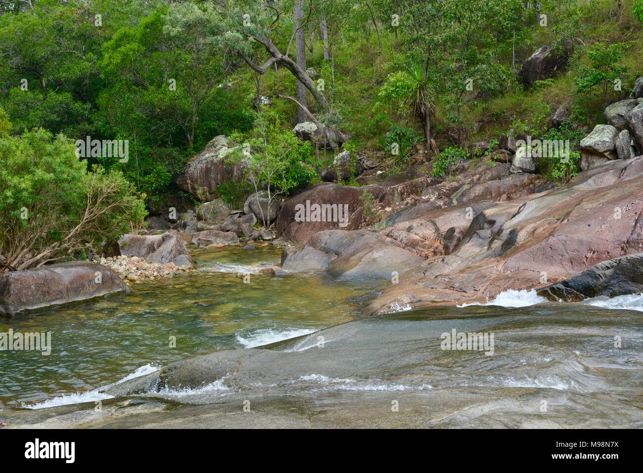 Waterfalls and cascades at the rockslides at big Crystal Creek QLD 4816 ...