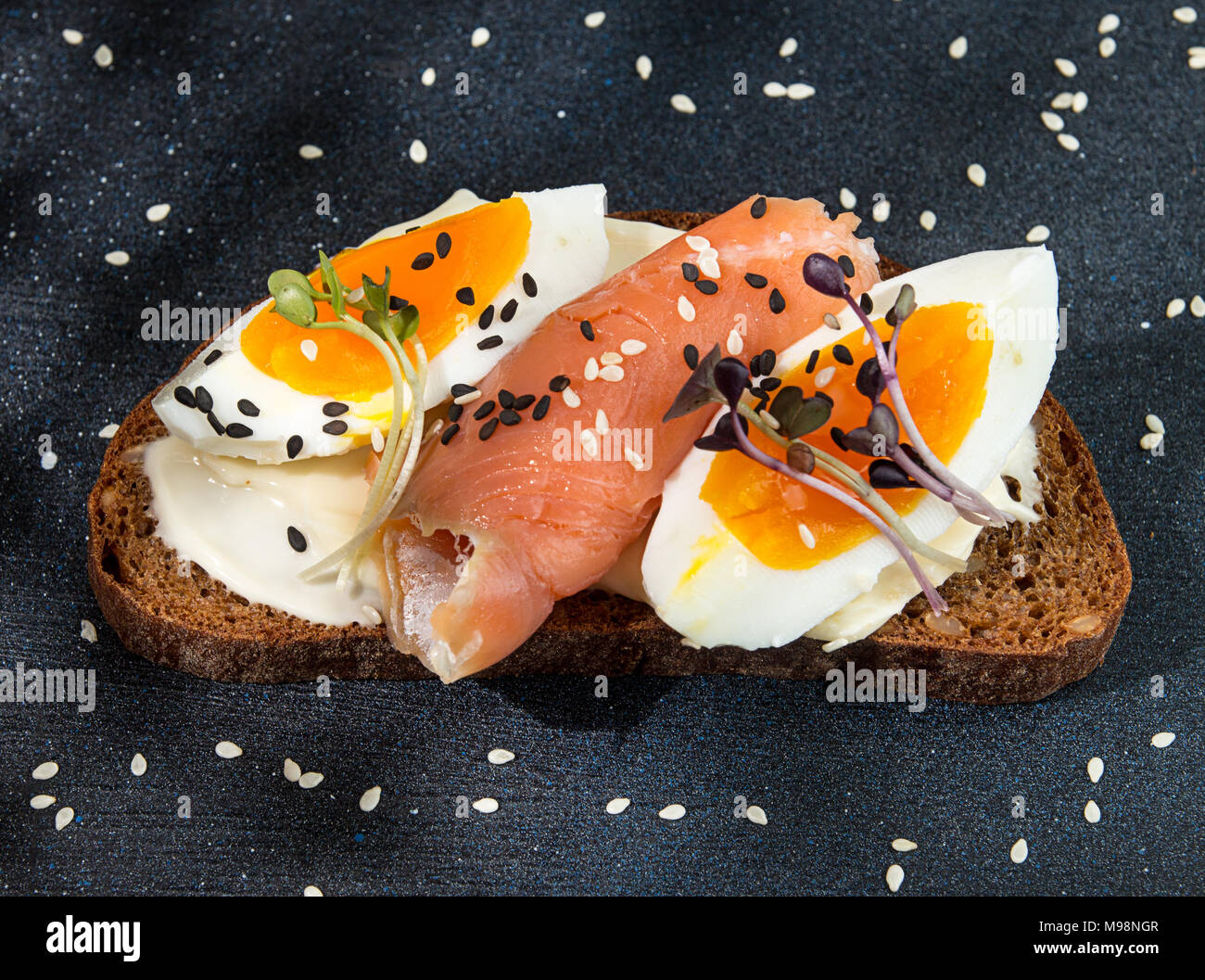 Healthy breakfast toasts. Wholegrain rye bread slices with cream cheese ...