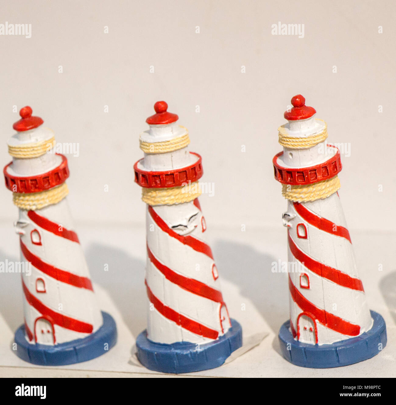 Set of Little handmade model lighthouses Stock Photo - Alamy
