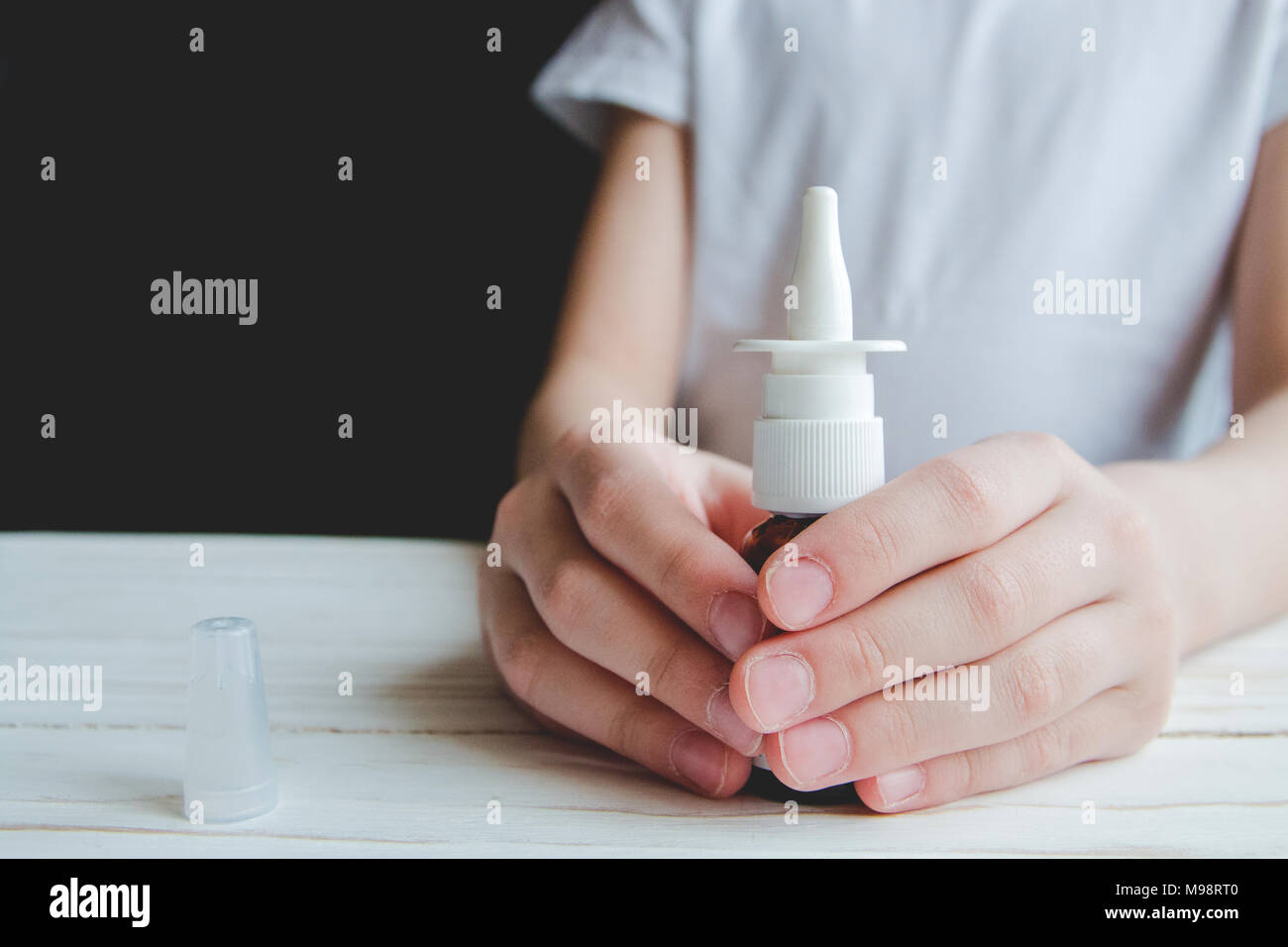 children's hands hold the nasal spray Stock Photo - Alamy