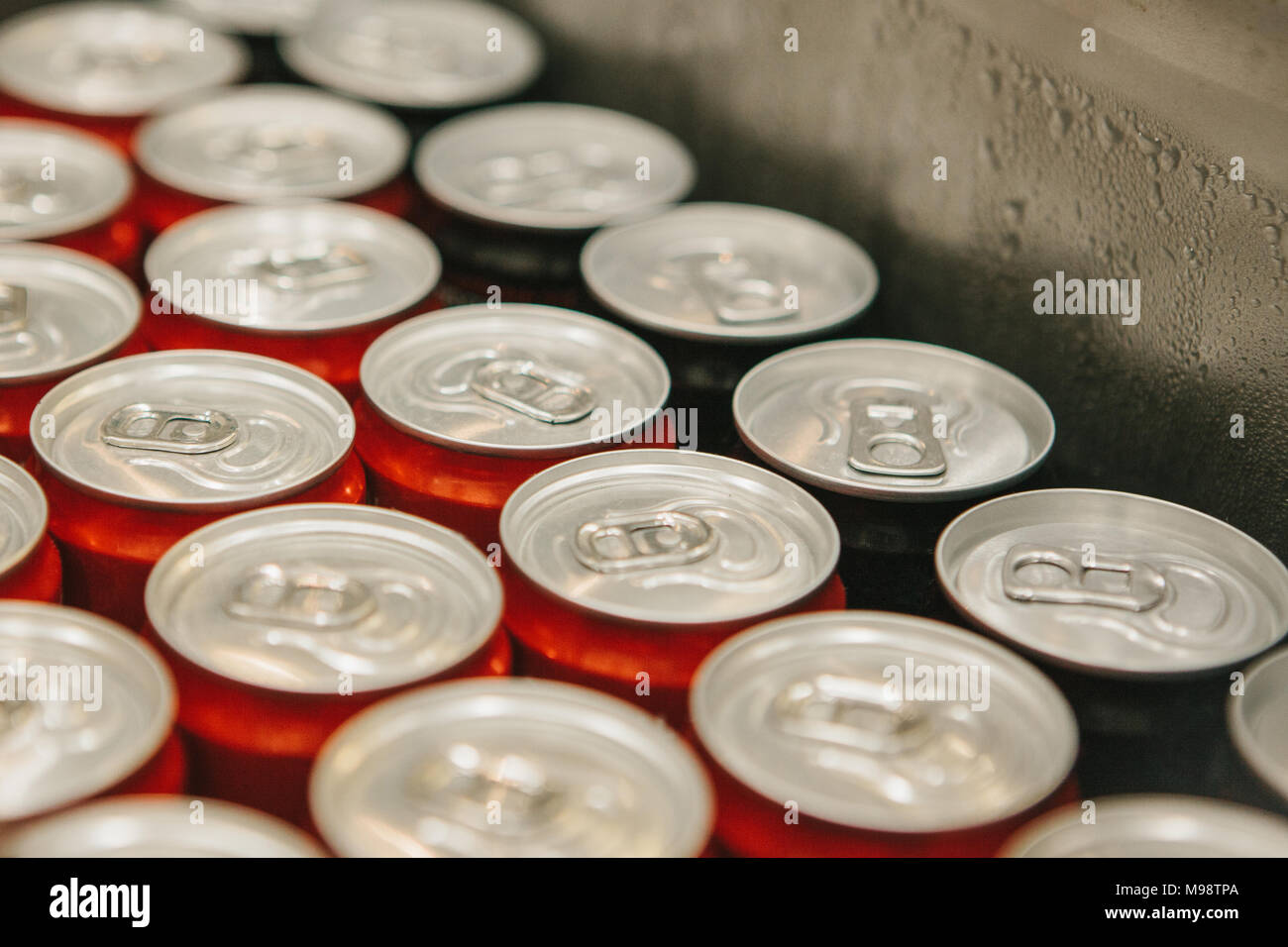 Many metal cans with cool drinks. Beverages. A group of objects Stock ...