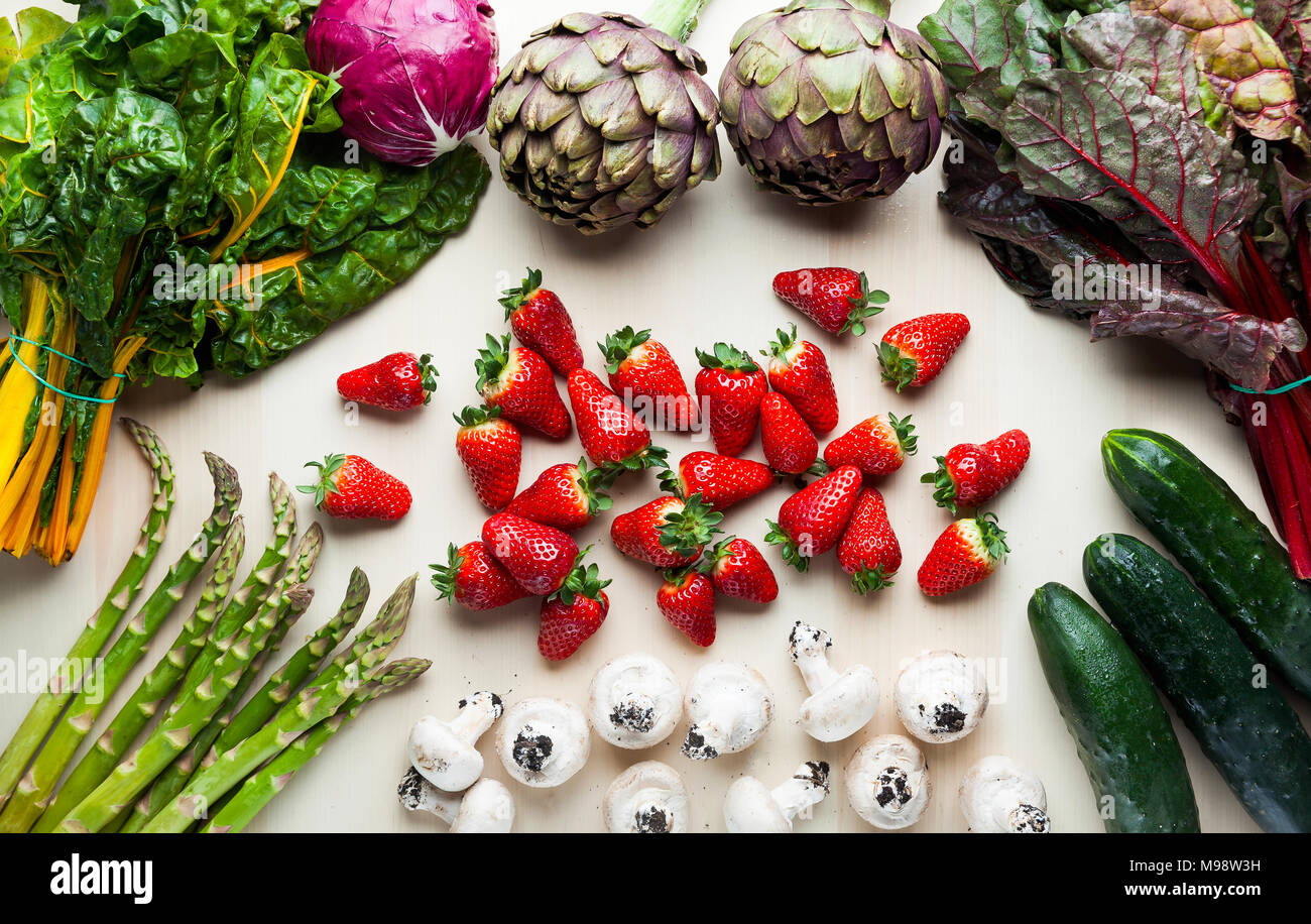 food background with Italian spring and summer vegetables and fruits ...