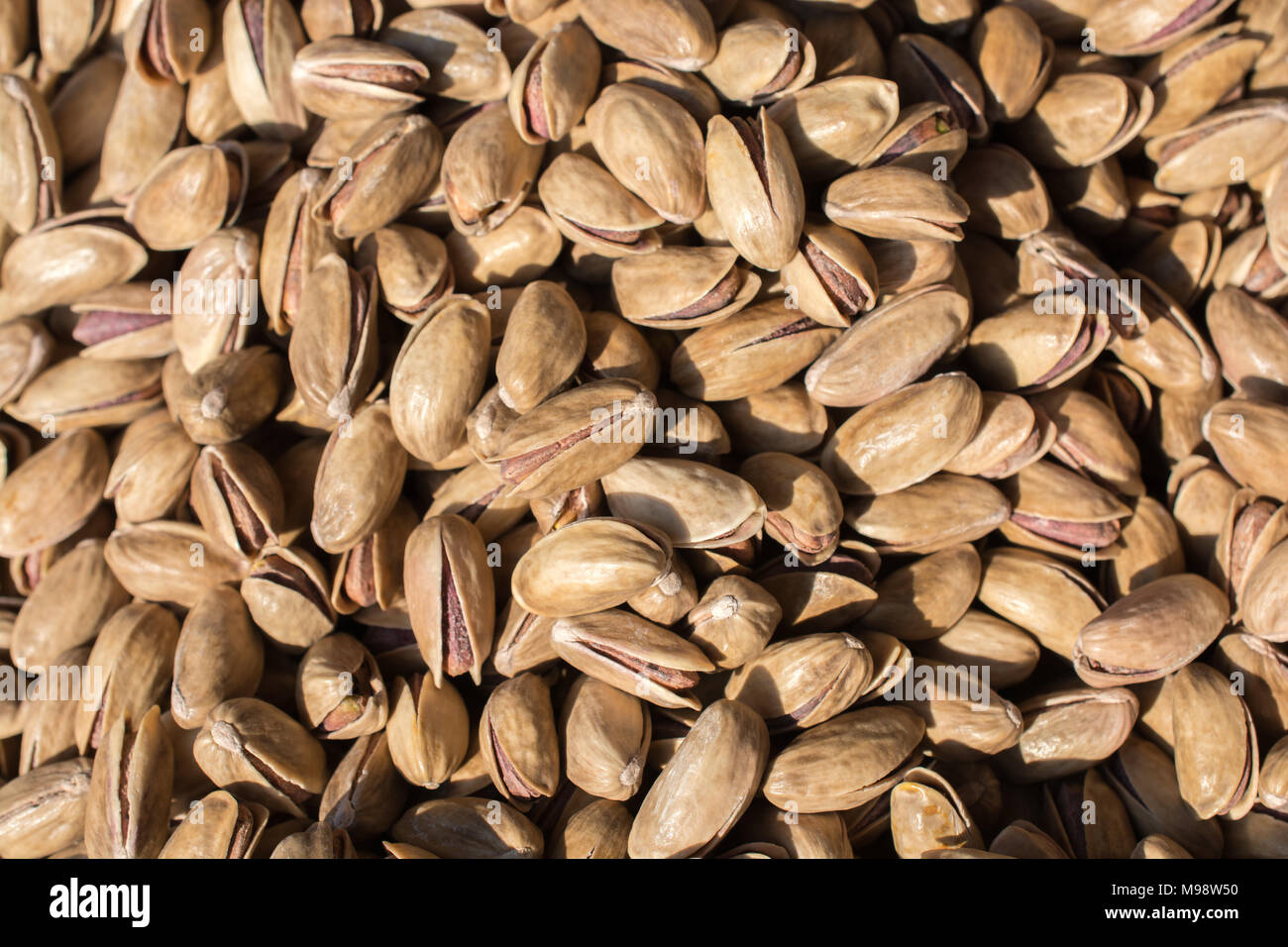 Pistachio nuts with shell ready to eat Stock Photo - Alamy