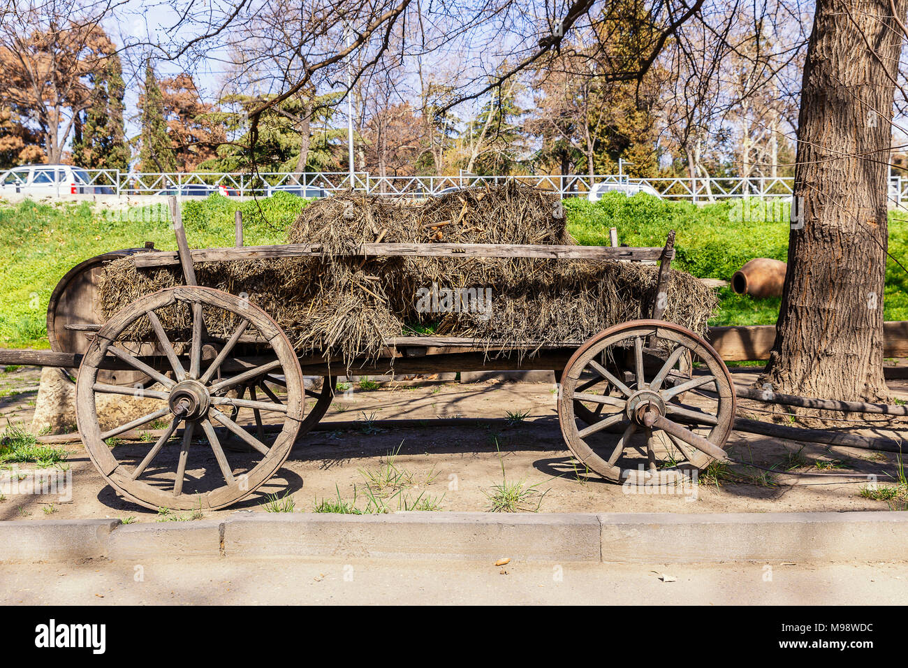 Wooden cart with hay hi-res stock photography and images - Alamy