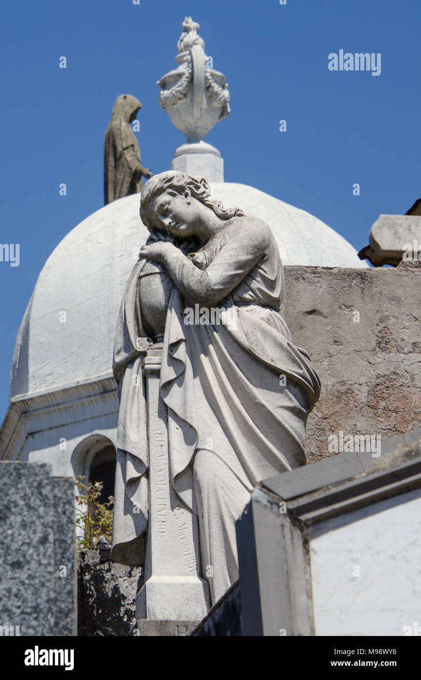 Stone female figure on tombstone raising. Tombstone guardian figures in ...