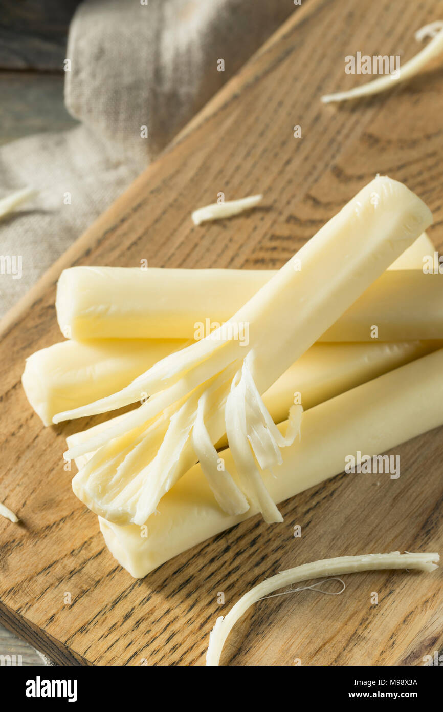 Healthy Organic String Cheese For a Snack Stock Photo - Alamy