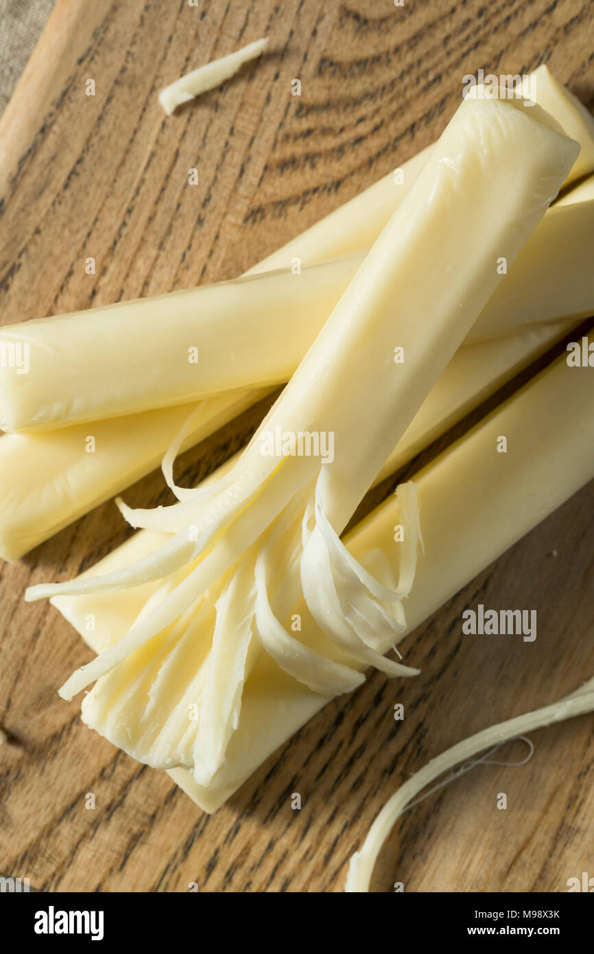 Healthy Organic String Cheese For a Snack Stock Photo - Alamy