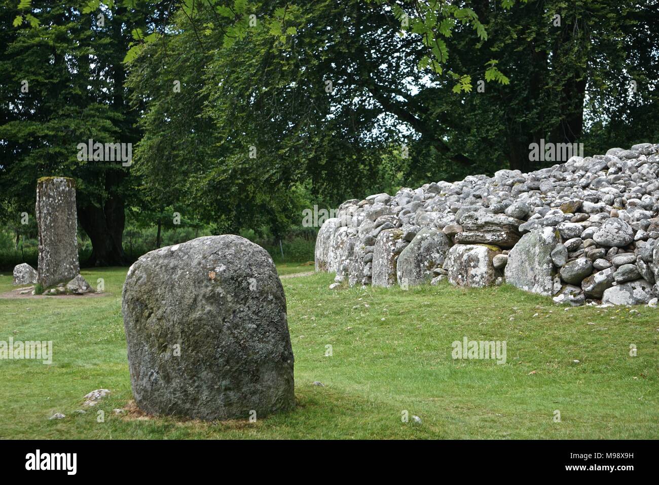 Two of the standing stones that form a ring around a circular Bronze ...