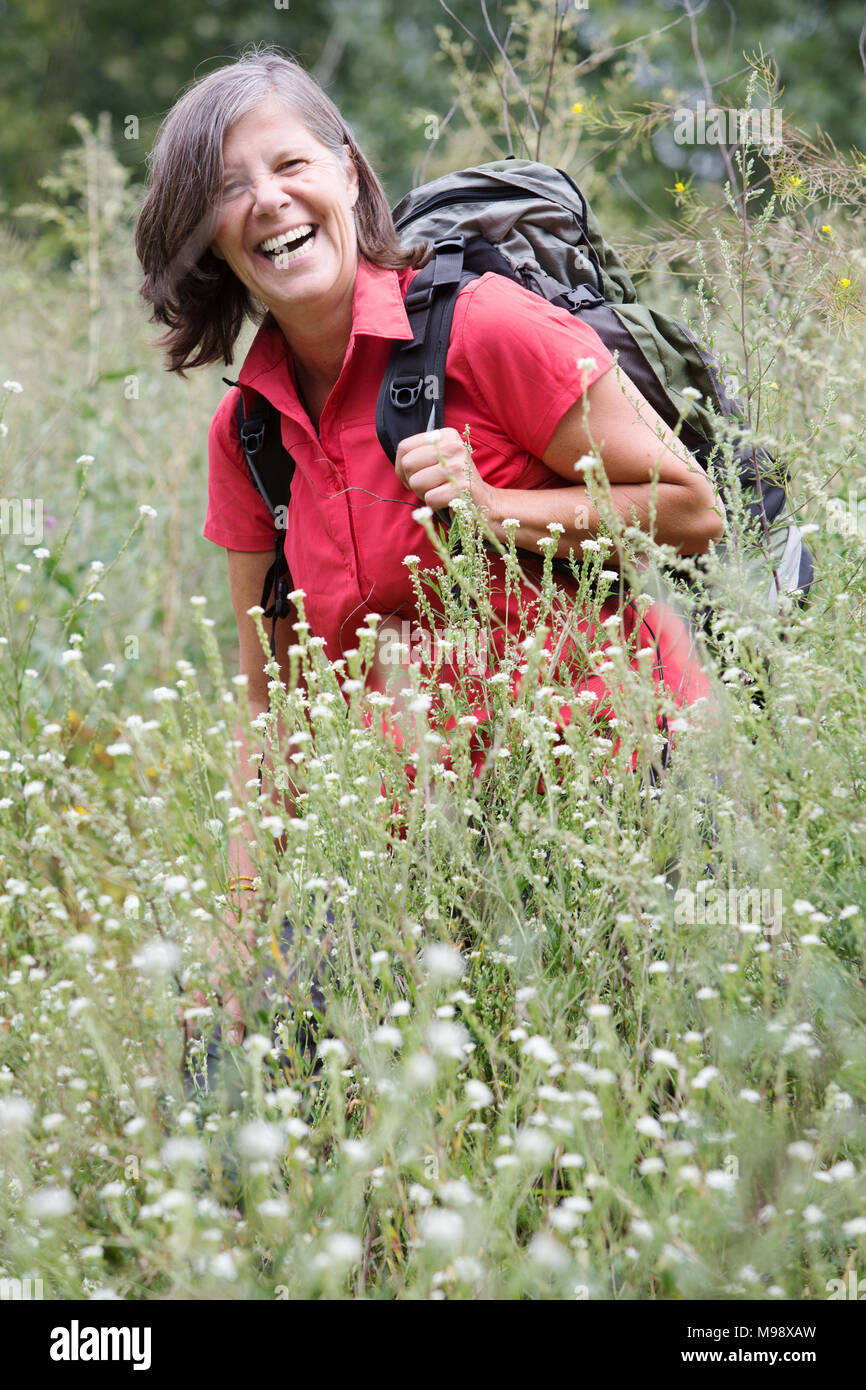 portrait of woman in her 50s hiking in nature Stock Photo - Alamy