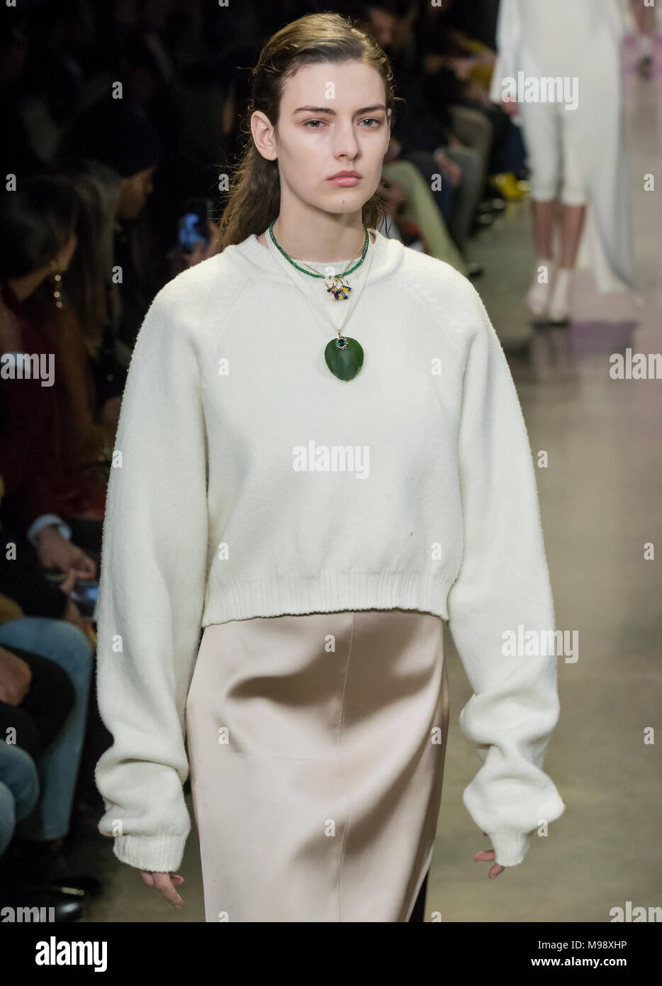 NEW YORK, NY - February 14, 2018: Marie Damian walks the runway at the ...