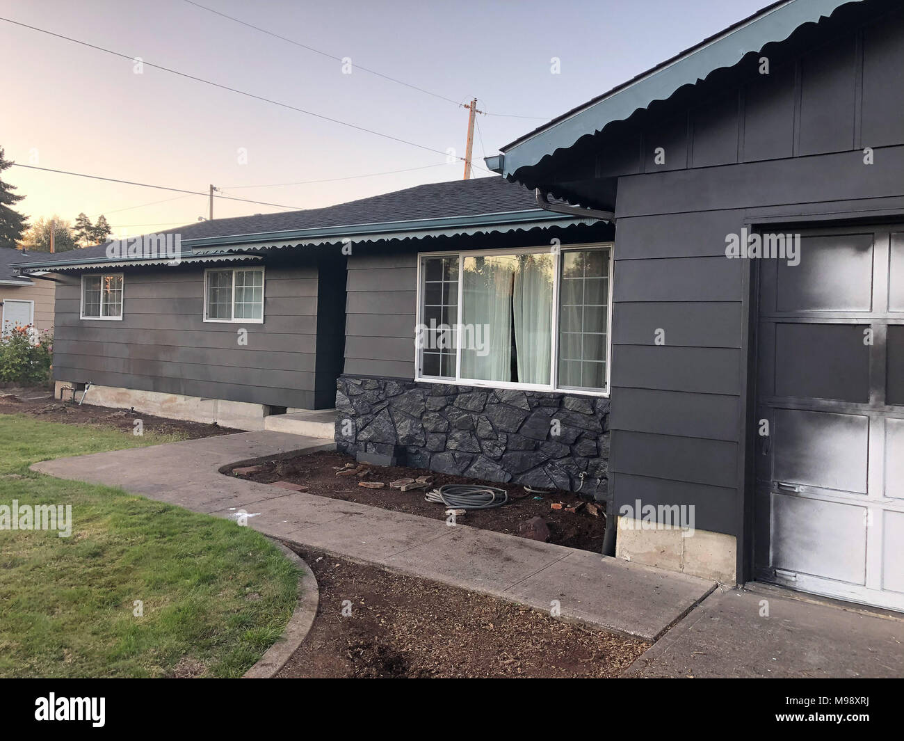 House Painting Progress on Renovation Stock Photo - Alamy