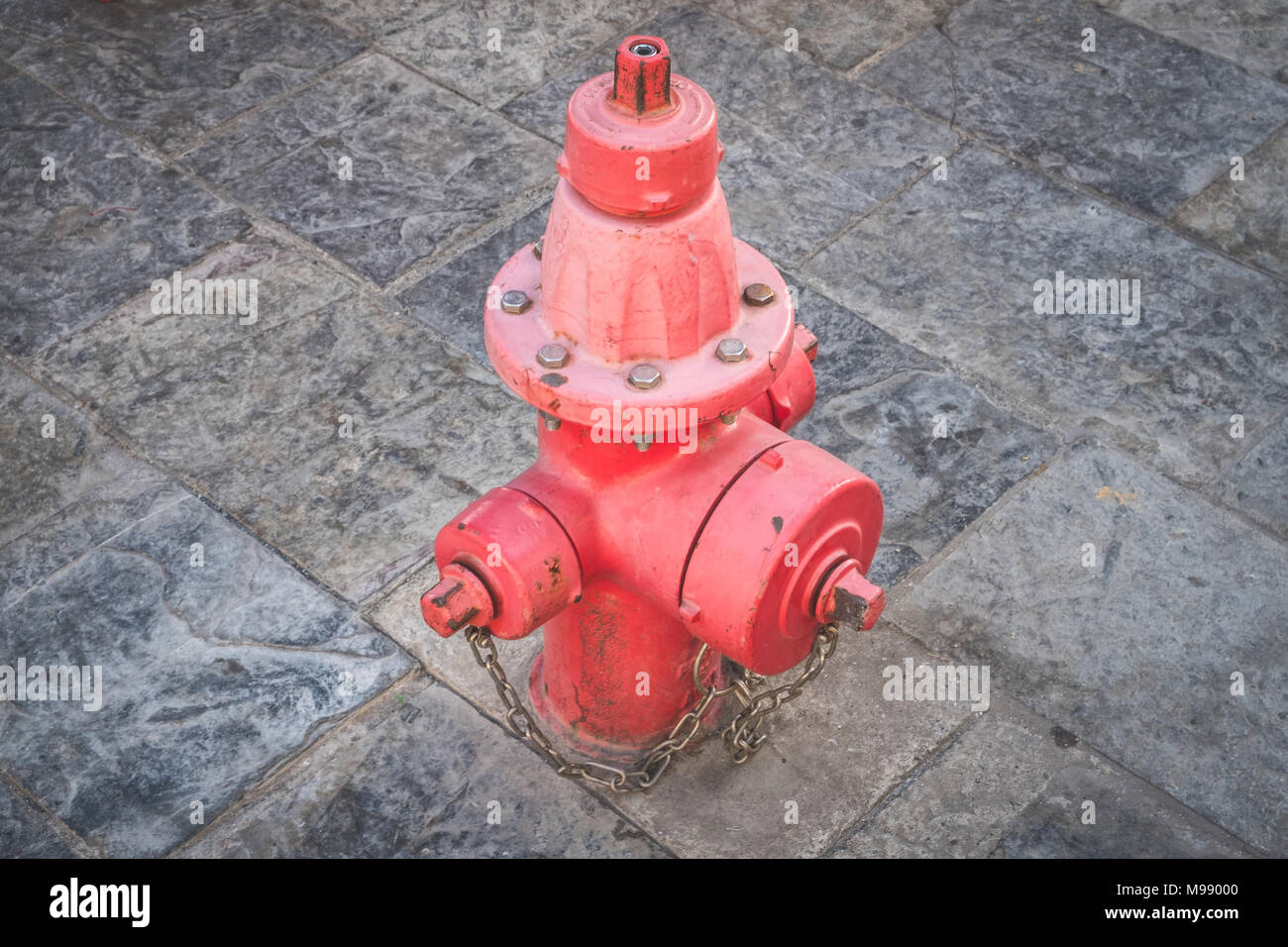 red hydrant isolated on street - vintage red hydrant Stock Photo - Alamy