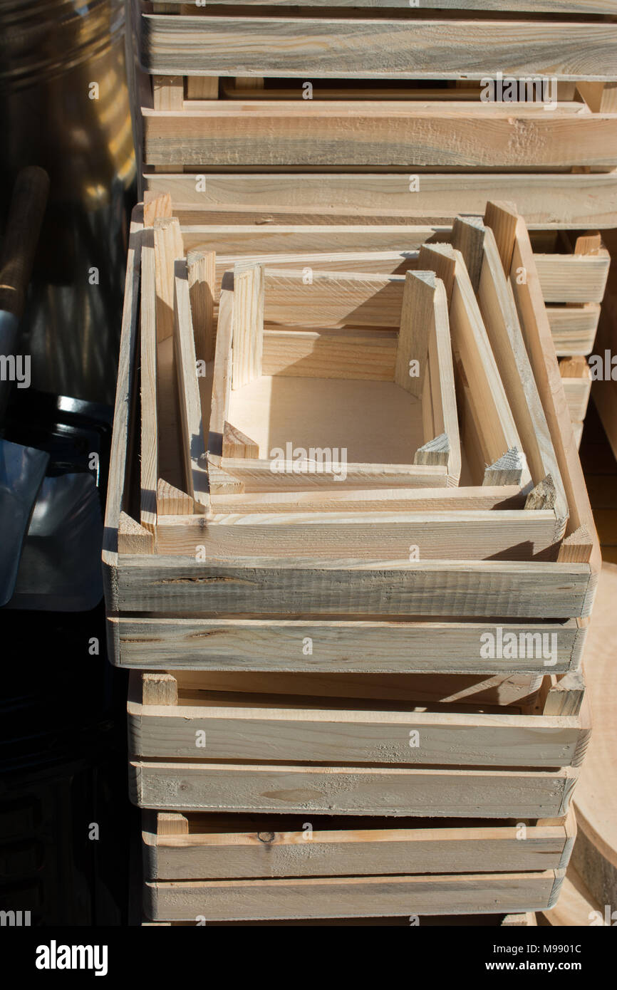 Wooden empty crate box for sale in a market Stock Photo - Alamy