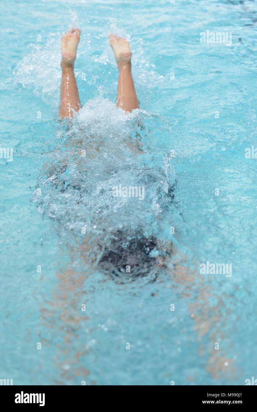 Woman swimming butterfly, Kokoda swimming pool, Townsville, Queensland ...