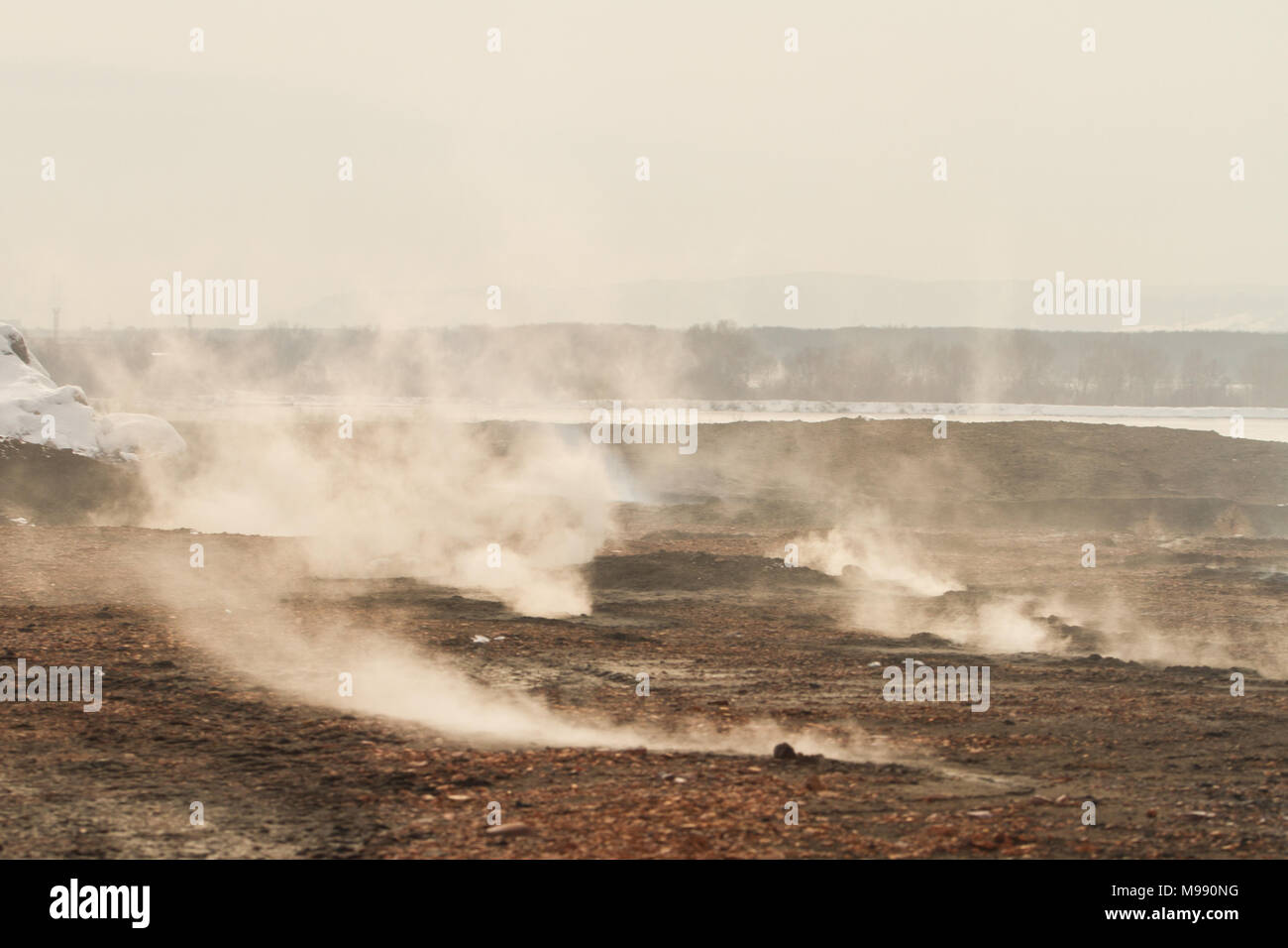 slag dump, smoke on slag dump, pollution Stock Photo - Alamy