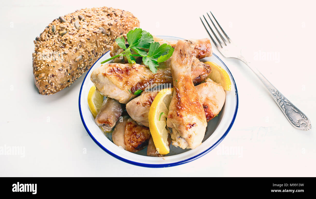 Roasted chicken legs. Top view Stock Photo - Alamy