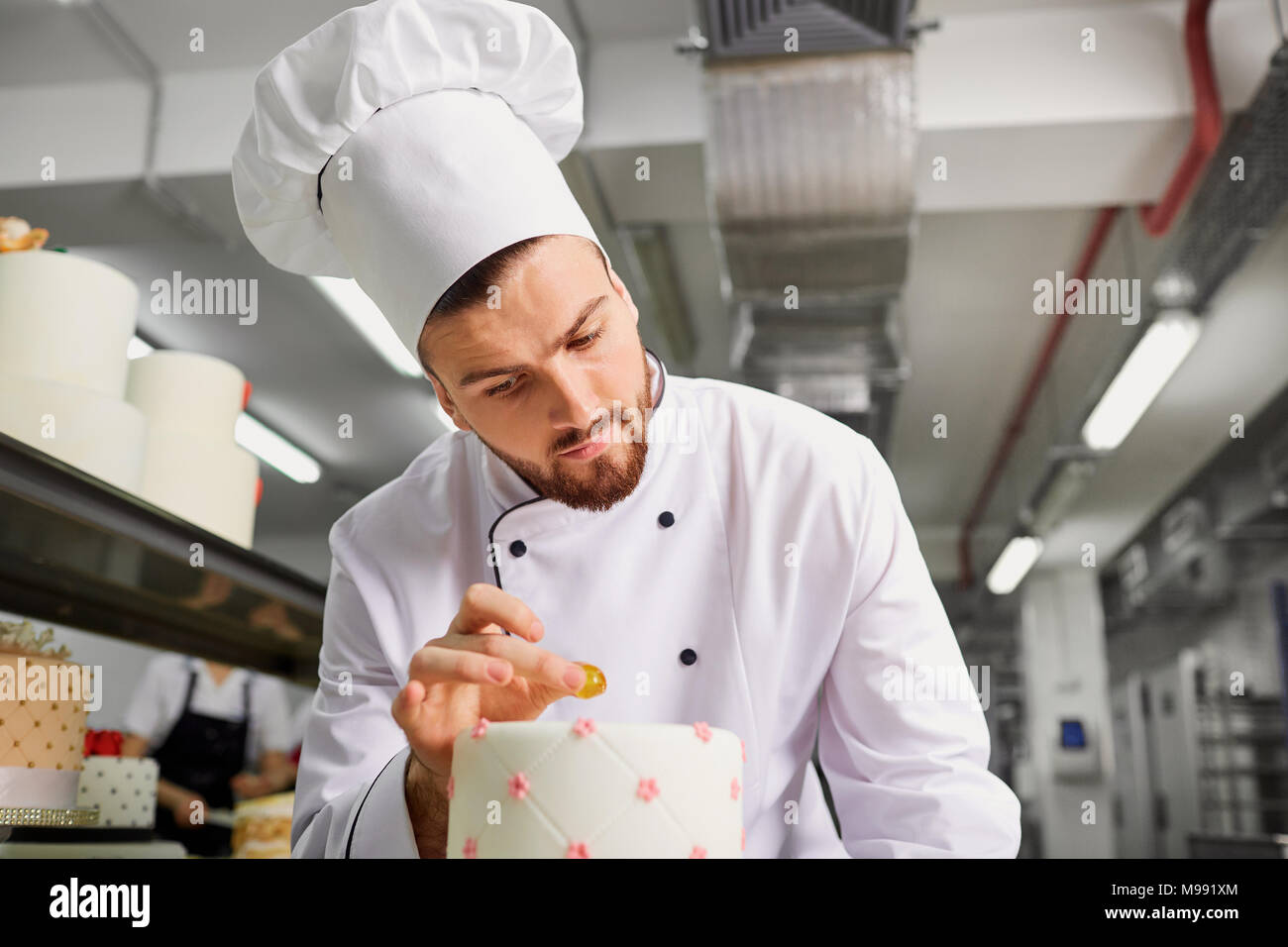 Bakery cook hi-res stock photography and images - Alamy