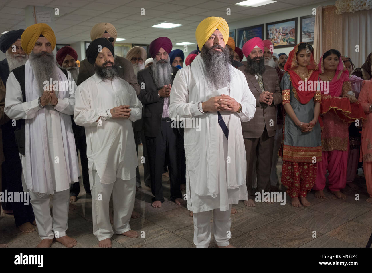 Sikh priests - Granthis - preside over a wedding at the Sikh Cultural ...