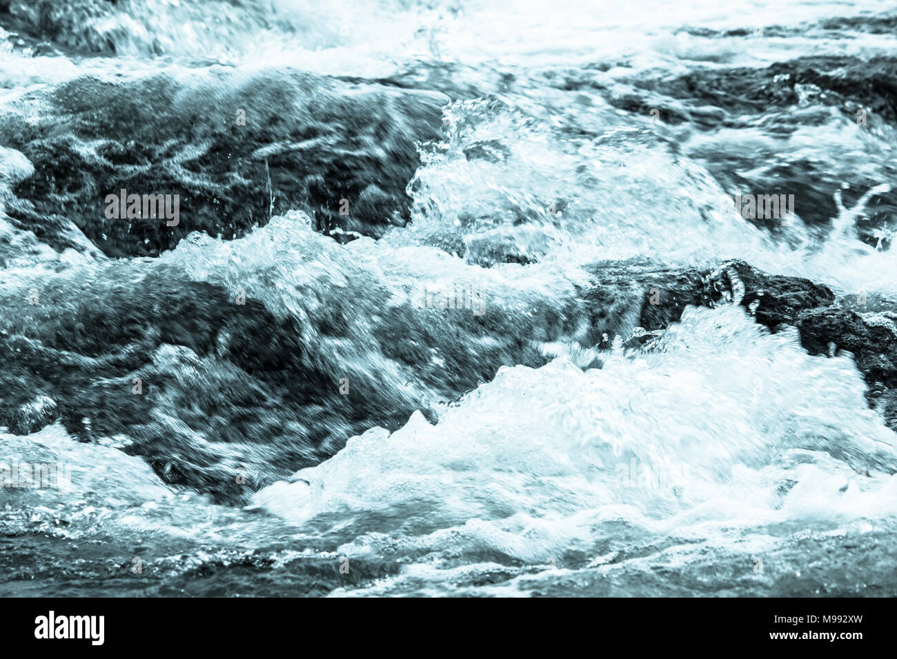 Mountain river. Water flow close-up as background Stock Photo - Alamy