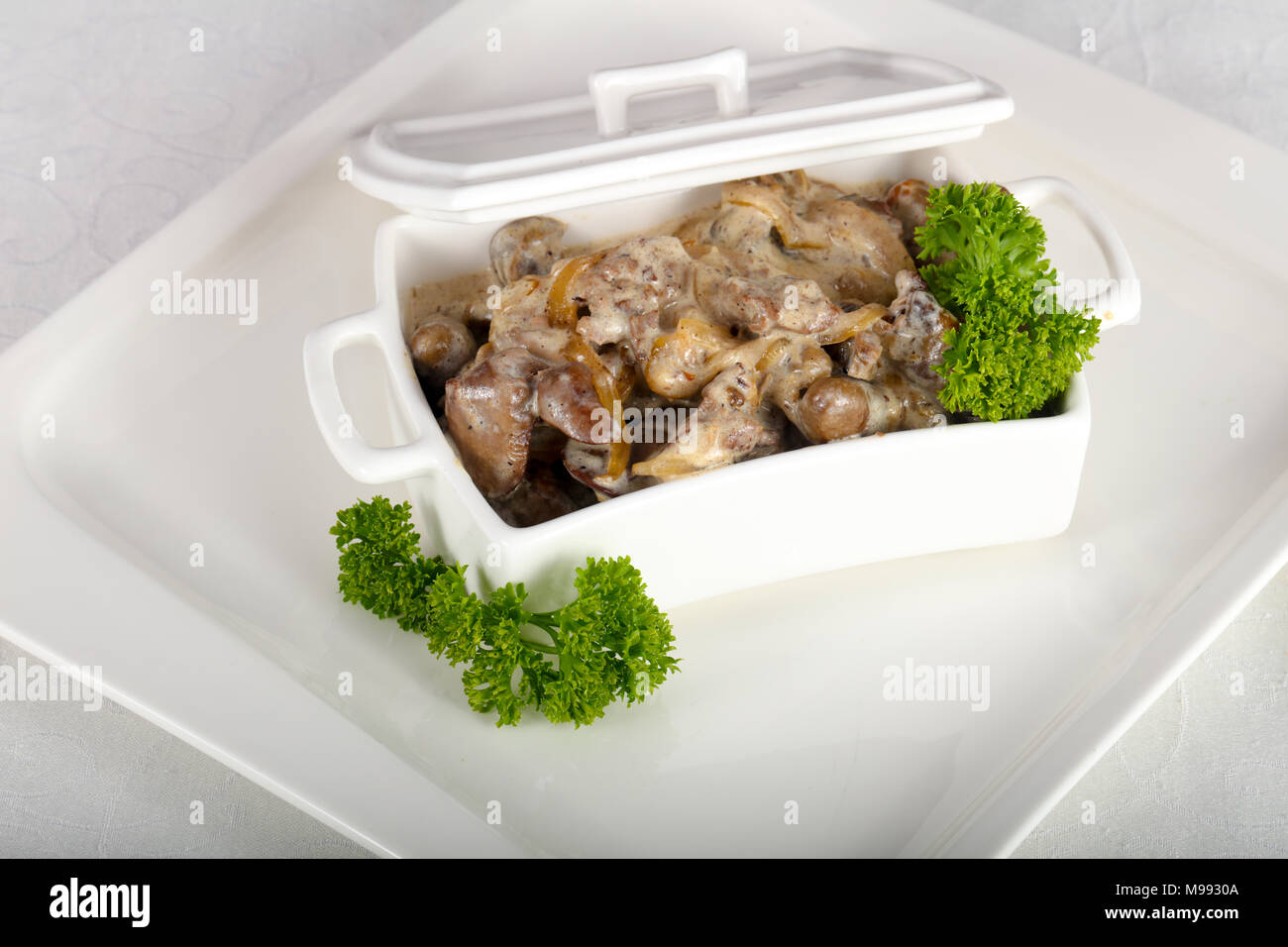 Baked Chicken offals Stock Photo - Alamy